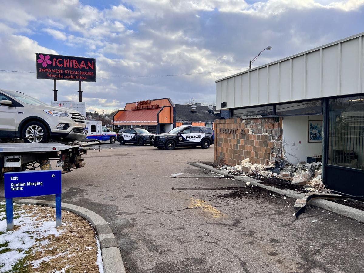 Vehicle crashes through Chemung Canal bank in Auburn (video)