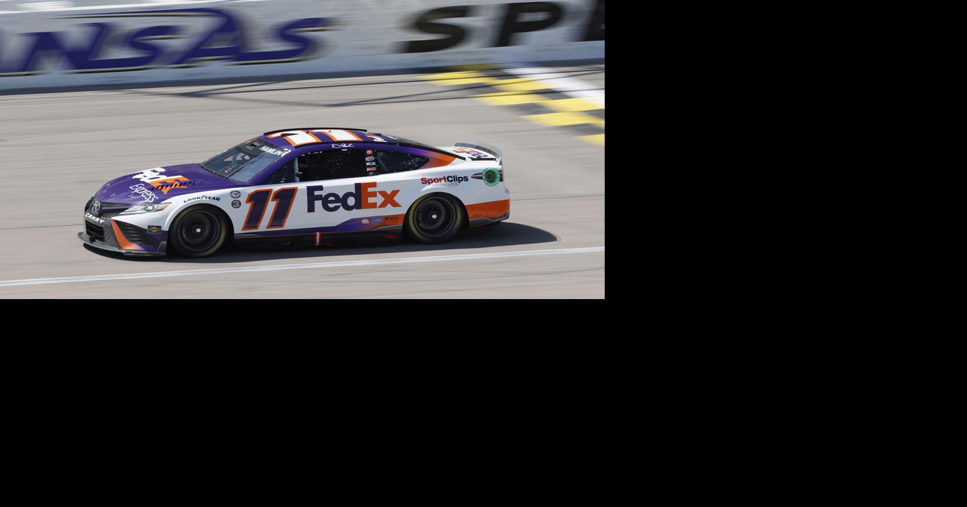 Hamlin bumps Larson for lead on final lap to win at Kansas