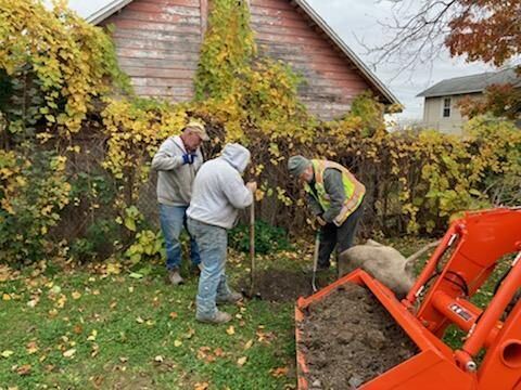 Trees planted at Auburn school honor former teacher, custodian