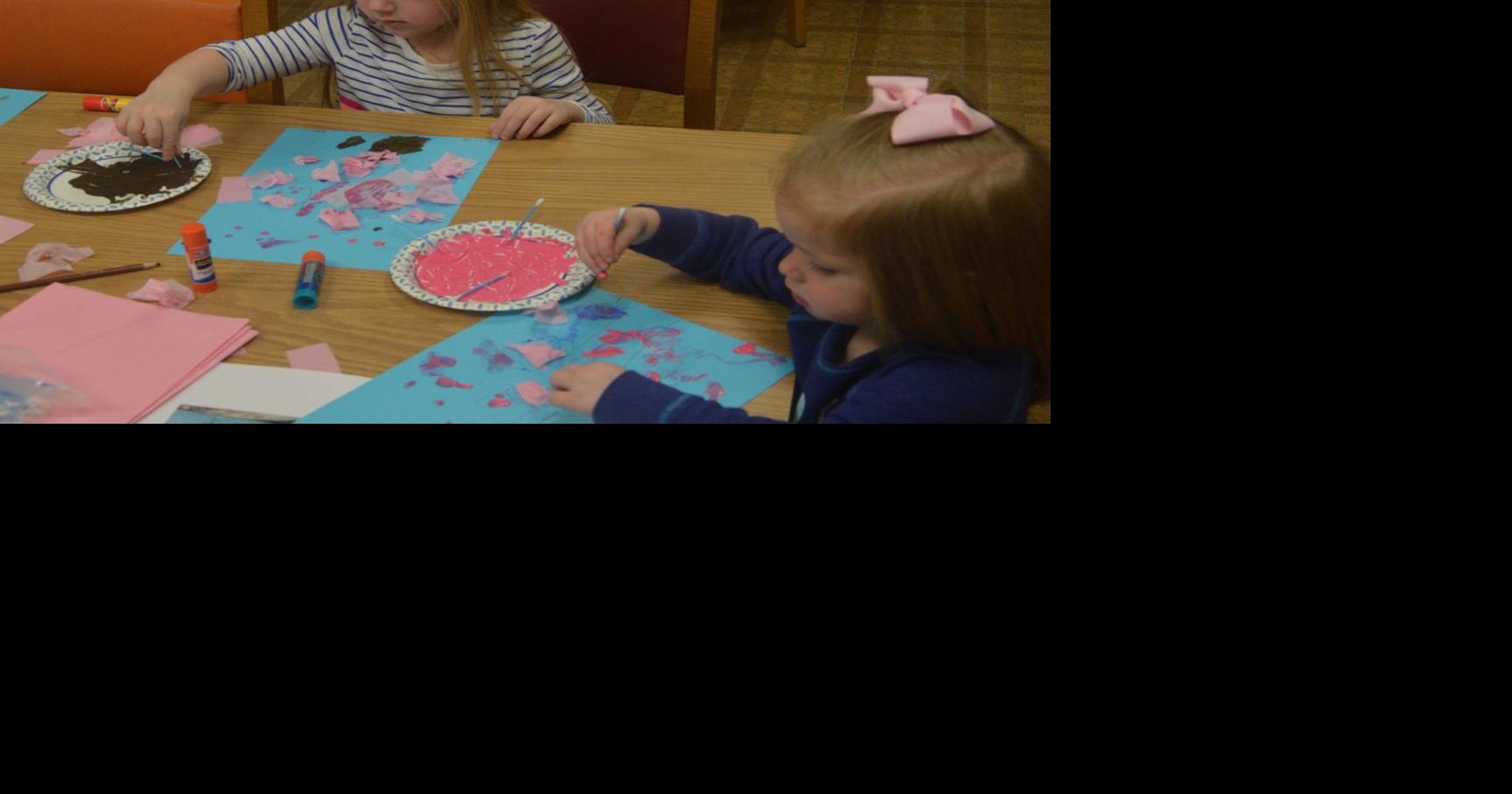 Children create cherry tree crafts during spring break at Seymour ...