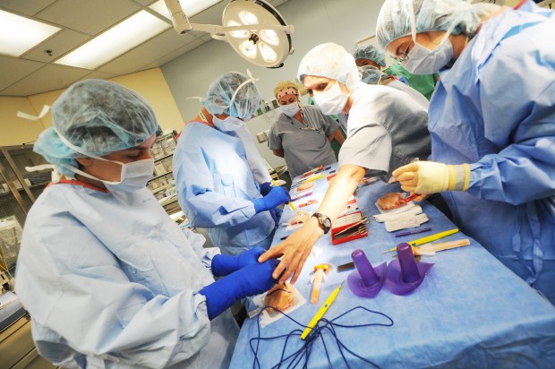 Tomorrow's health-care providers try on their scrubs at Auburn ...