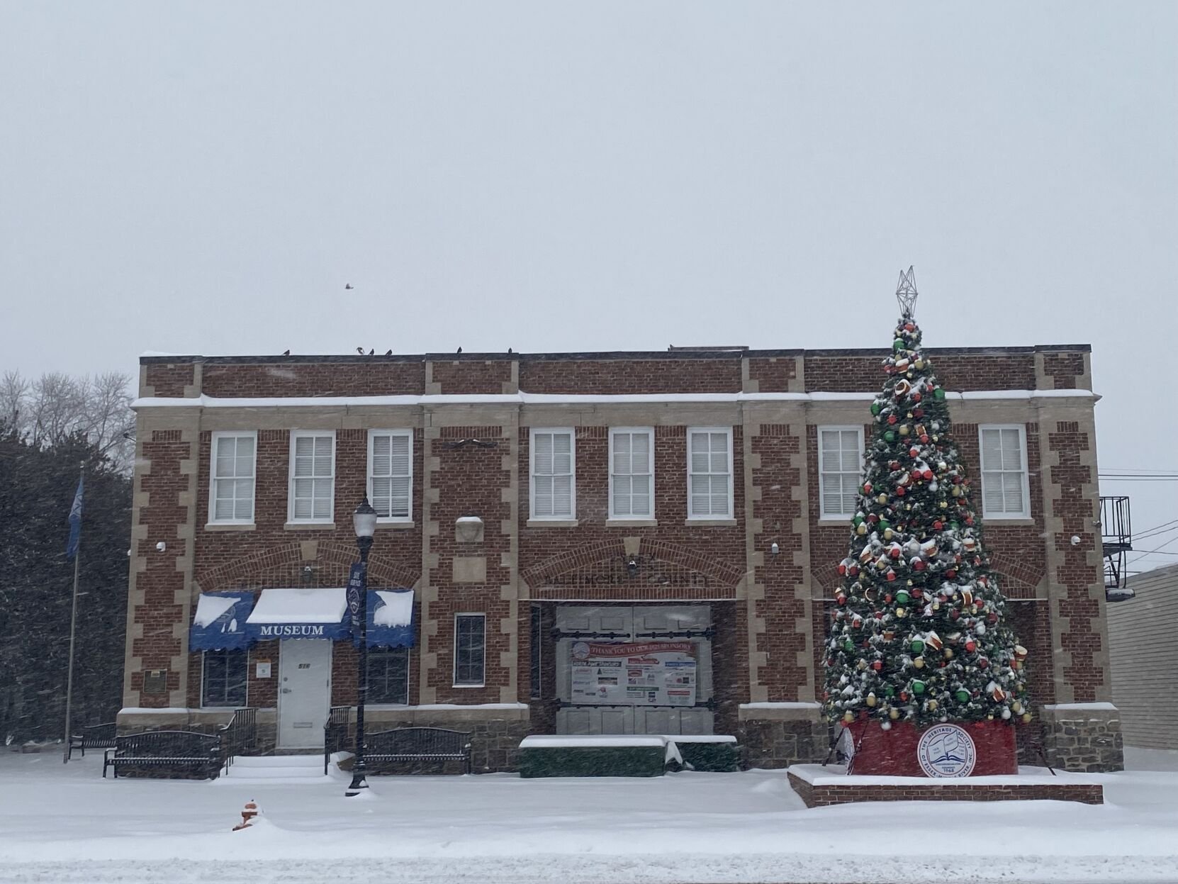 Snow covered Heritage Society Museum | | avenuenews.com