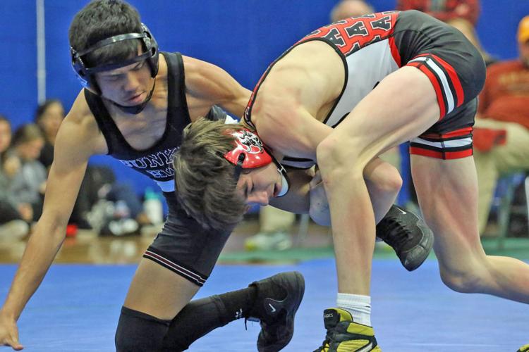 Vikings wrestlers meet strong field at Holy Angels Invitational ...