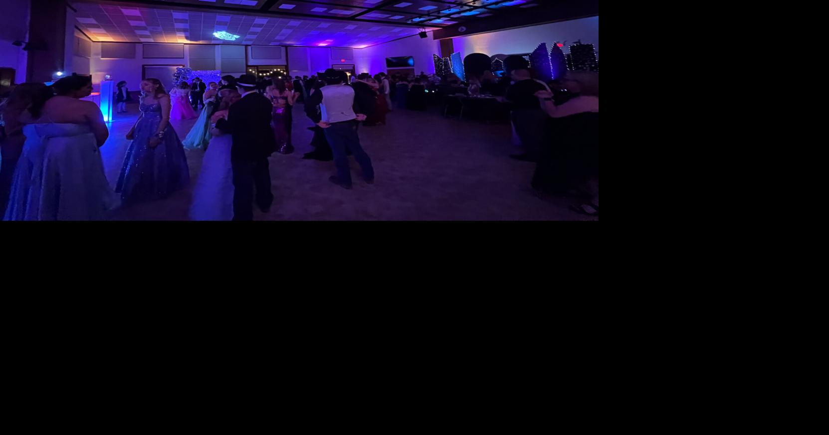 NIGHT LIGHTS: Avery students dance under cityscape during Prom ...