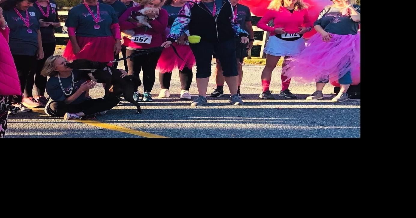 Community wraps arms around breast cancer survivors during 5K ...