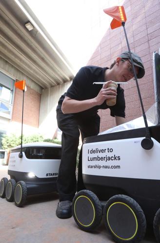 Positives, negatives cited by NAU students on delivery robots | Local ...