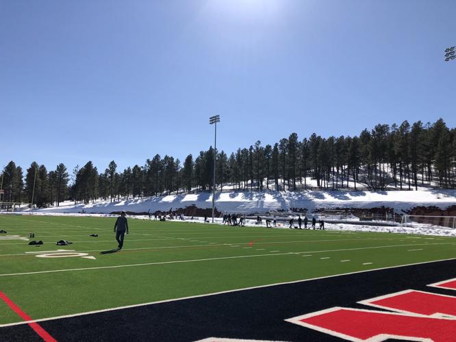Gallery: Community turns out to help Coconino clear its soccer field ...