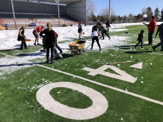 Gallery: Community turns out to help Coconino clear its soccer field ...
