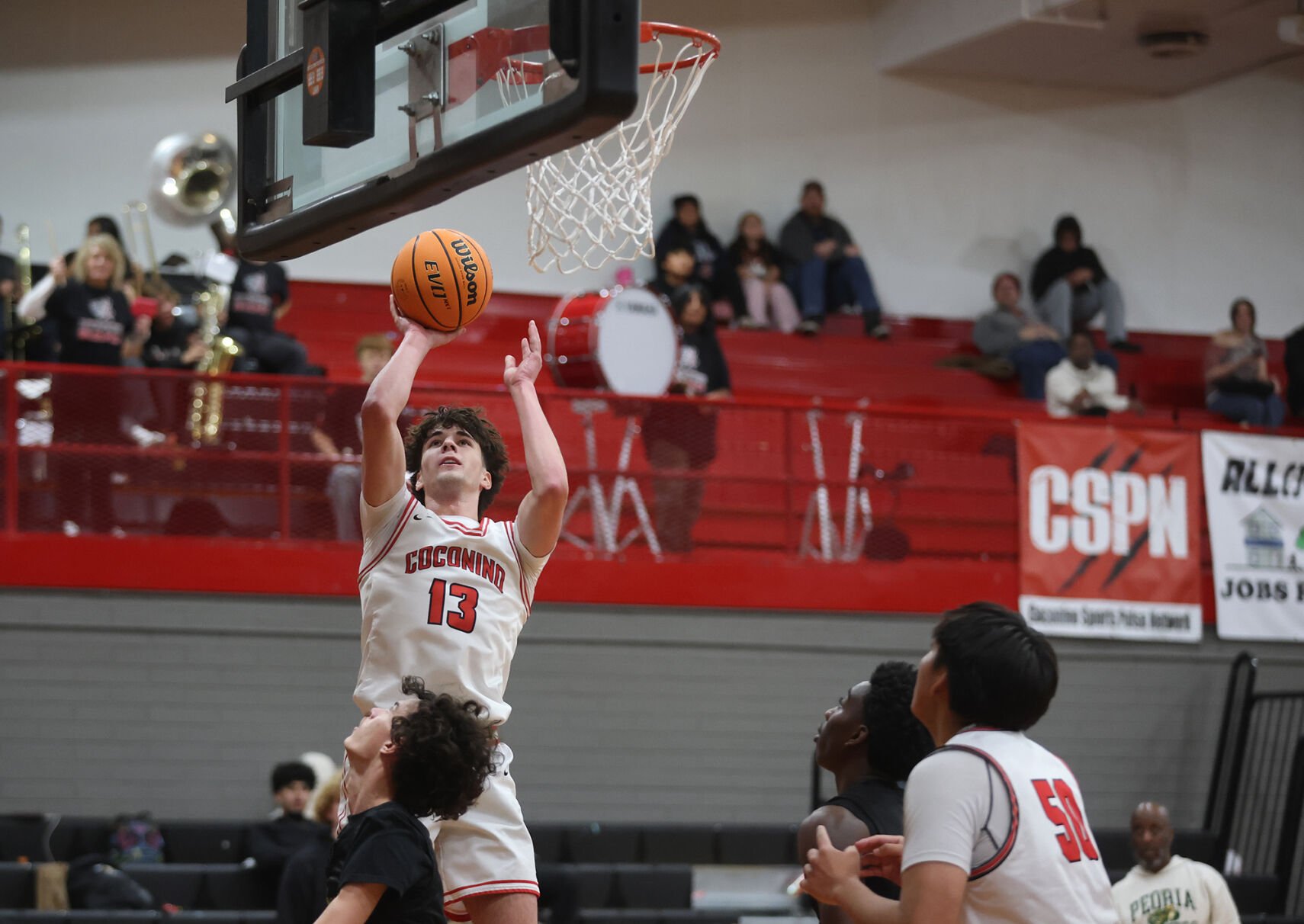 Nelson scores 27 as Coconino boys basketball runs over Peoria in battle ...