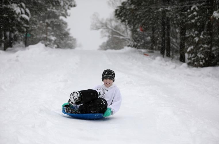 Storm systems leave Flagstaff buried in more than two feet of snow ...