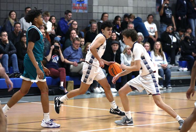 Spartans boys hoops pulls away in 4th quarter to secure home victory ...