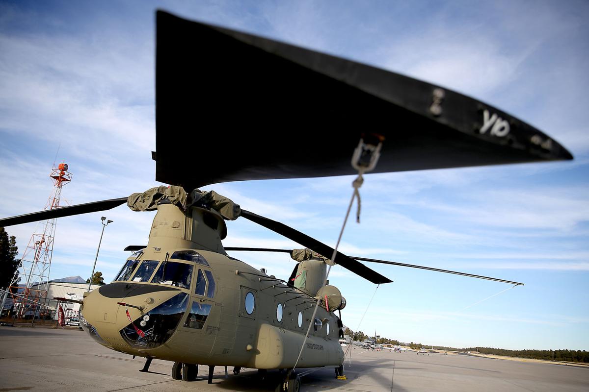 Photos: U.S. Army Chinook, Black Hawk and Apache helicopters stopped to ...