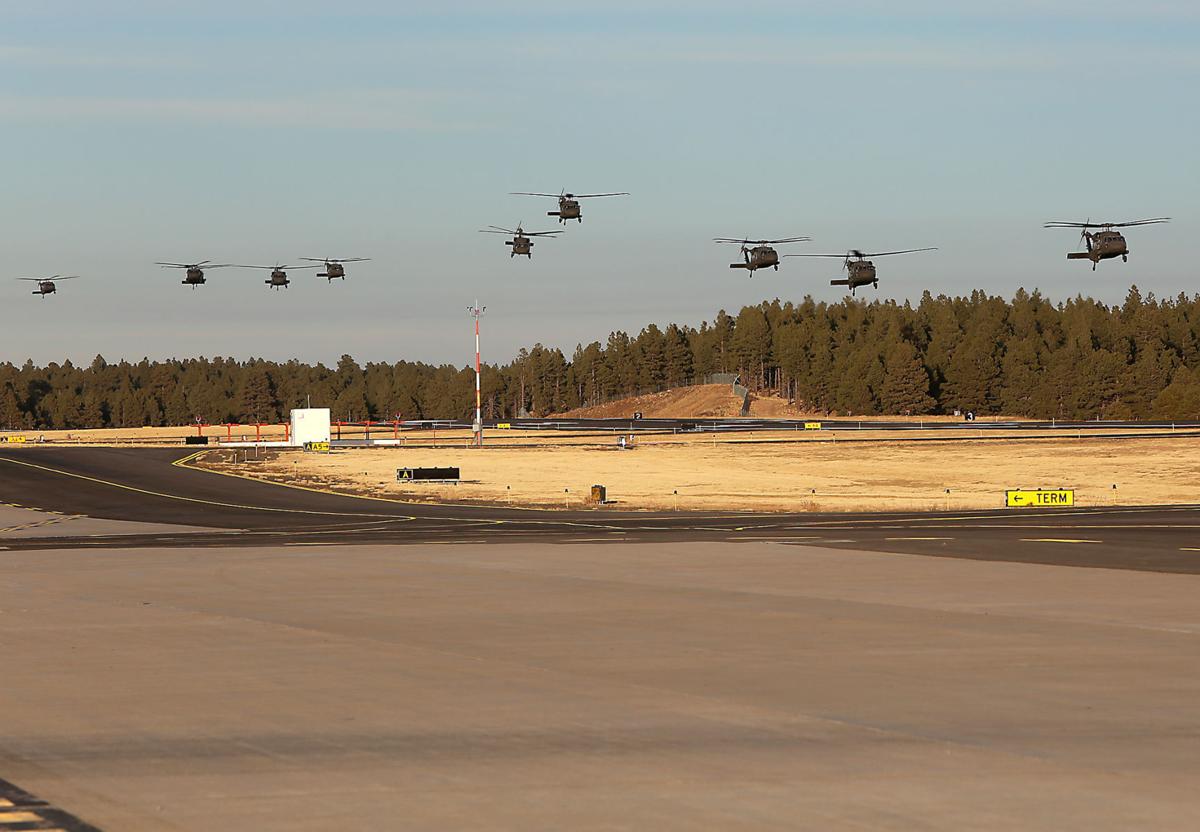 Photos: U.S. Army Chinook, Black Hawk and Apache helicopters stopped to ...