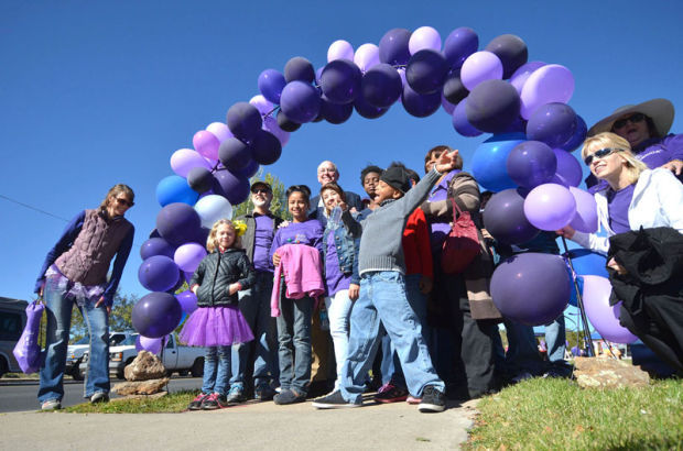 Purple ribbon campaign shines light on domestic violence
