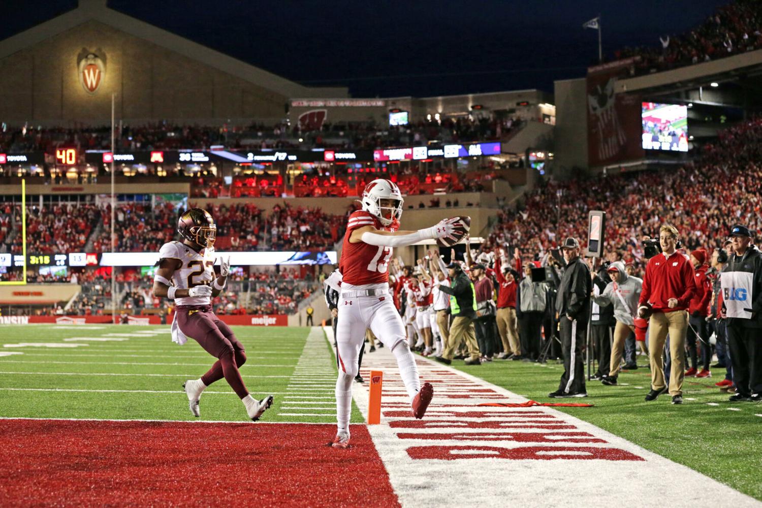 Wisconsin football players 'somber, sad' after 'devastating' loss of Axe