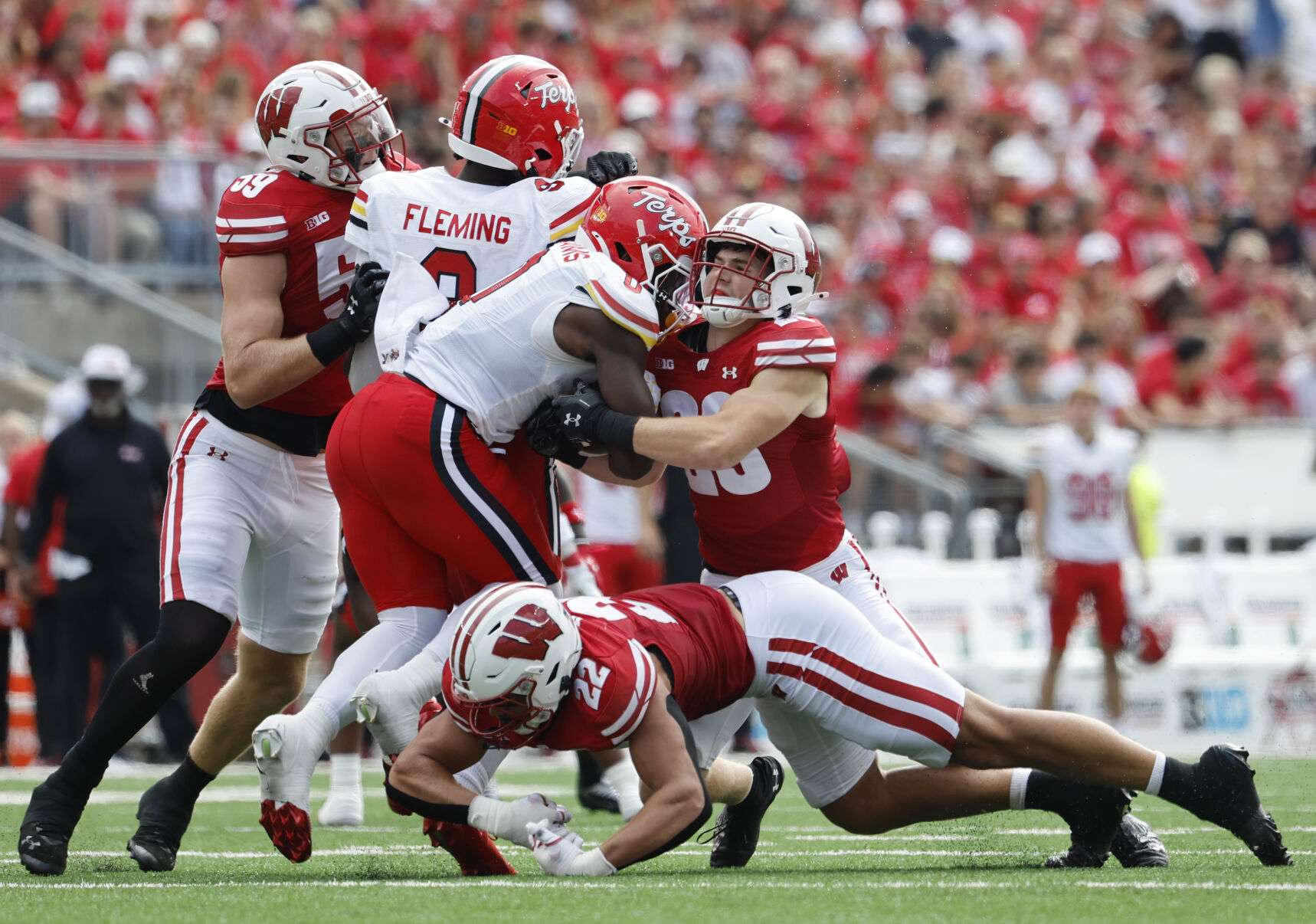 Badgers AD Chris McIntosh backs football coach Luke Fickell
