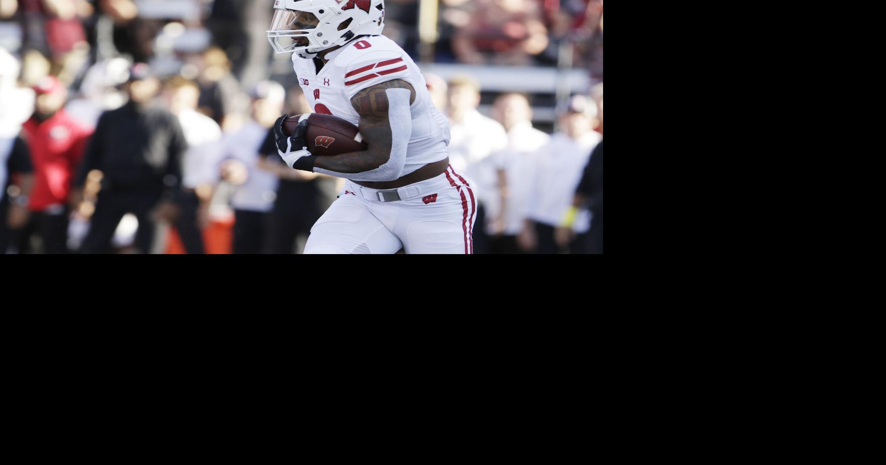 Wisconsin football's Braelon Allen talks with Luke Fickell