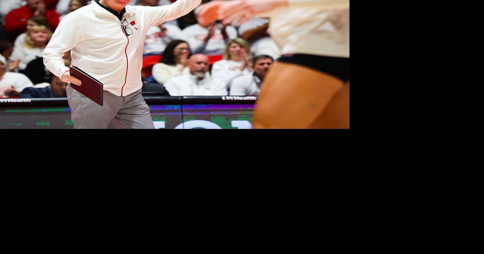 Outside hitter Eva Travis signs with Wisconsin volleyball