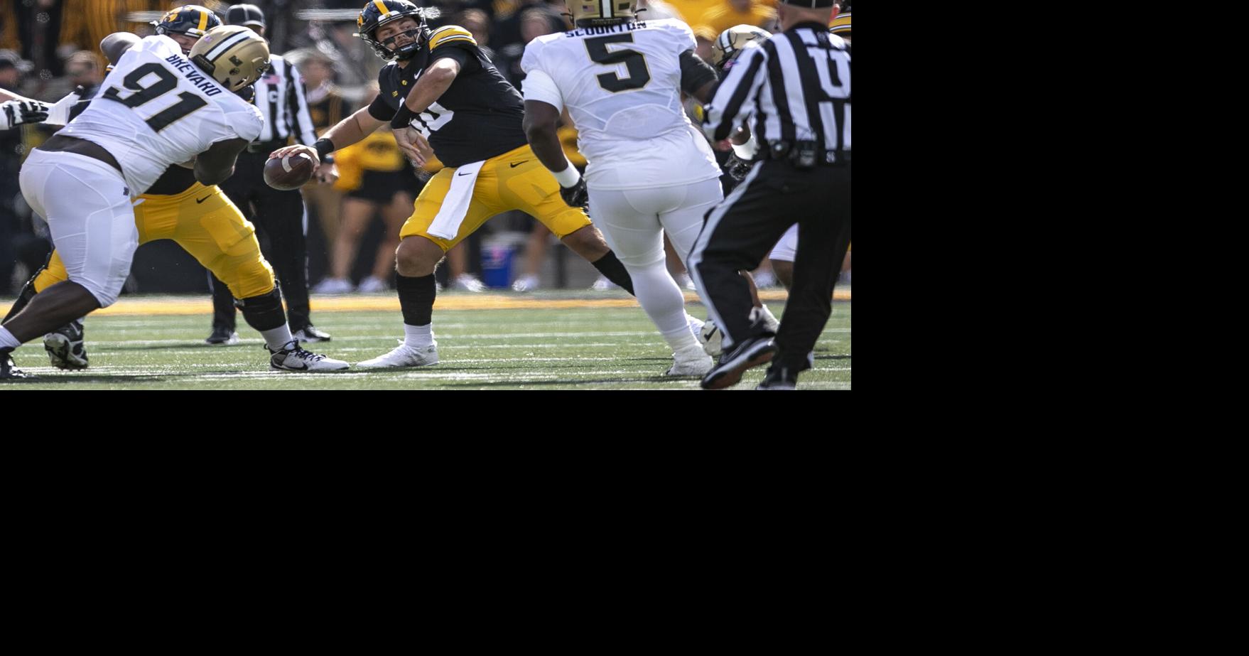 Wisconsin defense on Iowa quarterback Deacon Hill's return