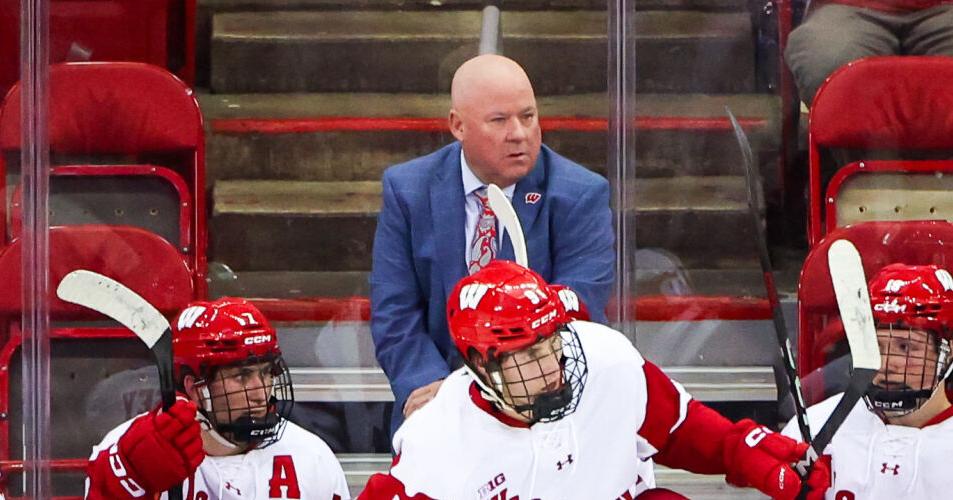 Why didn't Wisconsin men's hockey coach shake hands?