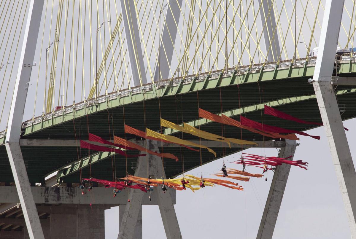 Greenpeace bridge protesters pay up: $60K | News | baytownsun.com
