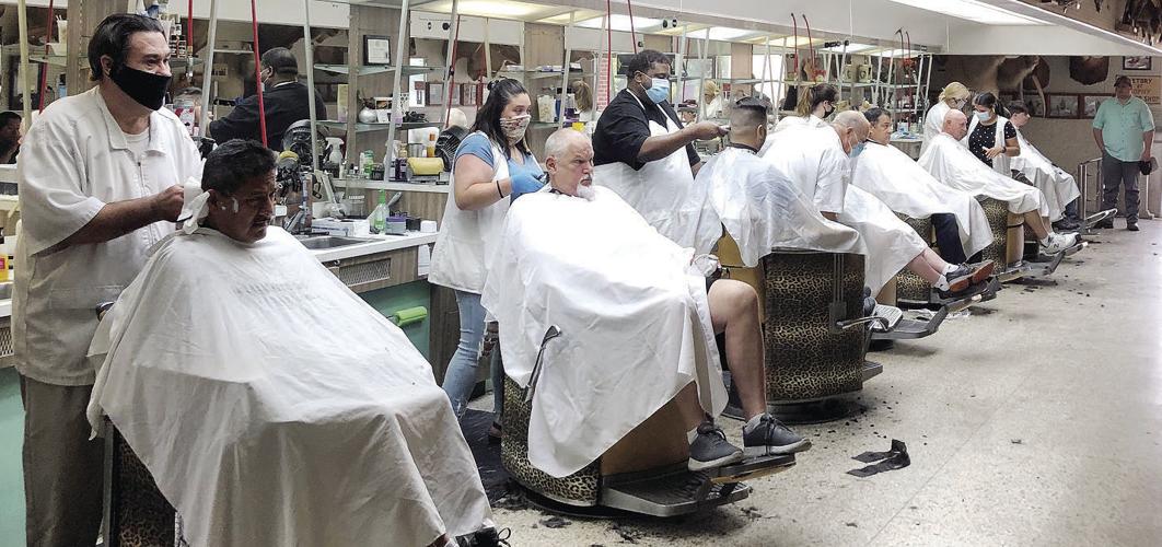 Cutting loose: Lines form for barber shops to reopen | News ...