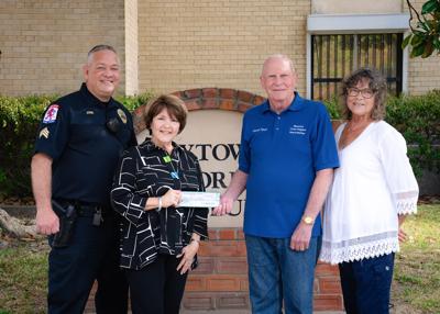 Crime Stoppers receives donation from Bay Area Heritage Society | Local ...