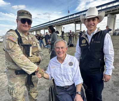 Cain, Abbott on Eagle Pass trip | Lifestyle | baytownsun.com