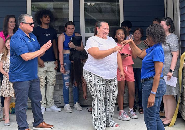 Habitat delivers home to family | News | baytownsun.com