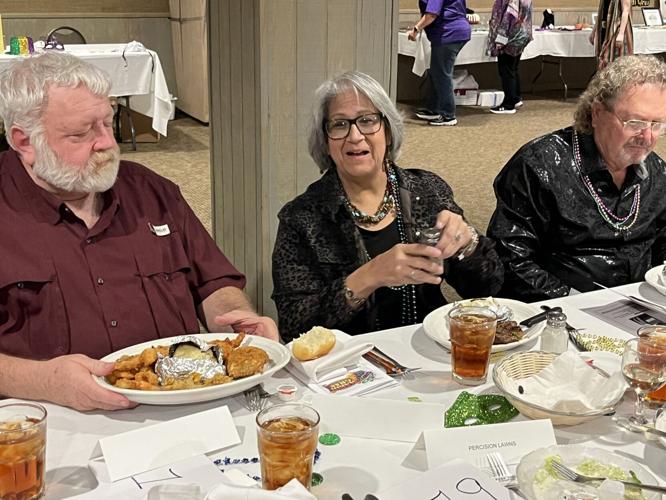 Evening Pilot Club celebrates Mardi Gras style | Local | baytownsun.com