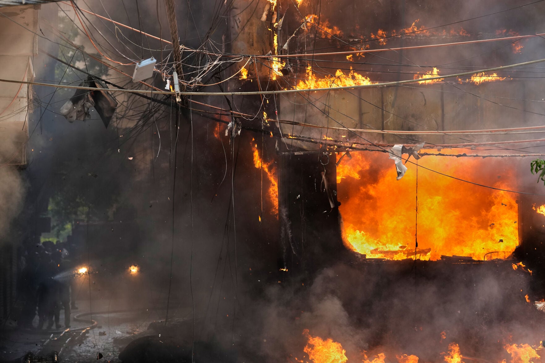 Photos show a rescue operation in a New Delhi hotel fire | College ...