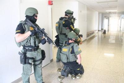 Tactical Response Unit practices school hostage scenario