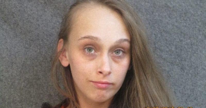 Woman arrested for assault following disturbance