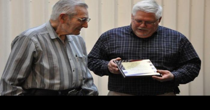 Mencl honored for 60 years of service
