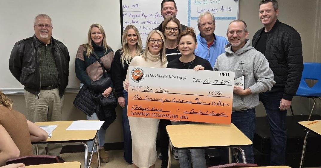 Clabaugh family presents Outstanding Educator award