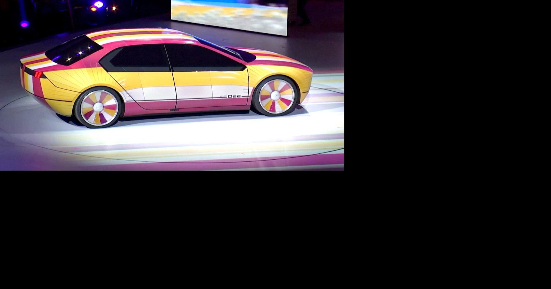 Arnold Schwarzenegger helps BMW unveil new color changing concept car