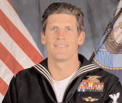 Crowds line streets to honor US Navy SEAL killed in action in Iraq ...