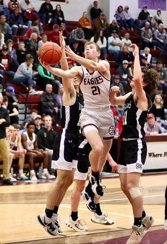 Manhattan Christian soars into district championship game; hold off ...