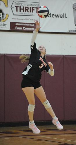 Manhattan Christian holds of Manhattan in 3 sets to sweep season series ...
