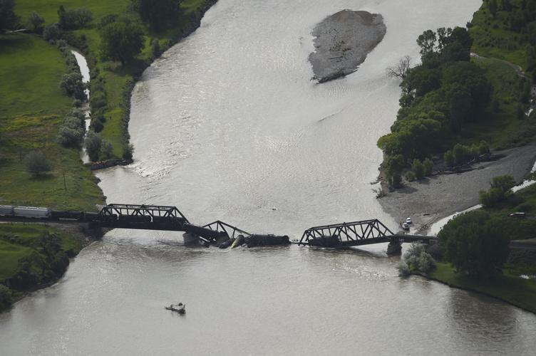 Work begins to clean up train derailment in Montana's Yellowstone River ...
