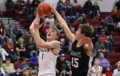 Manhattan Christian soars into district championship game; hold off ...
