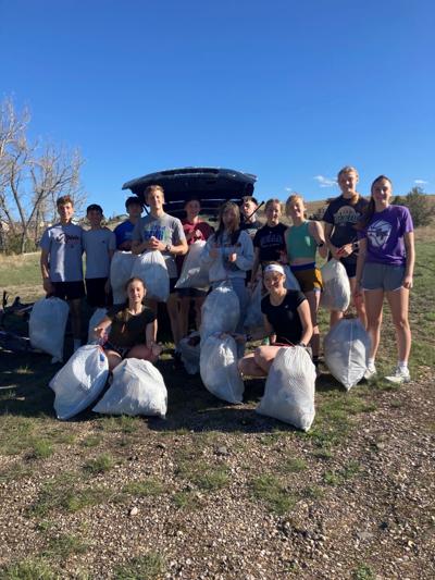 Broncs track team running with trash bags, making a difference on Earth ...