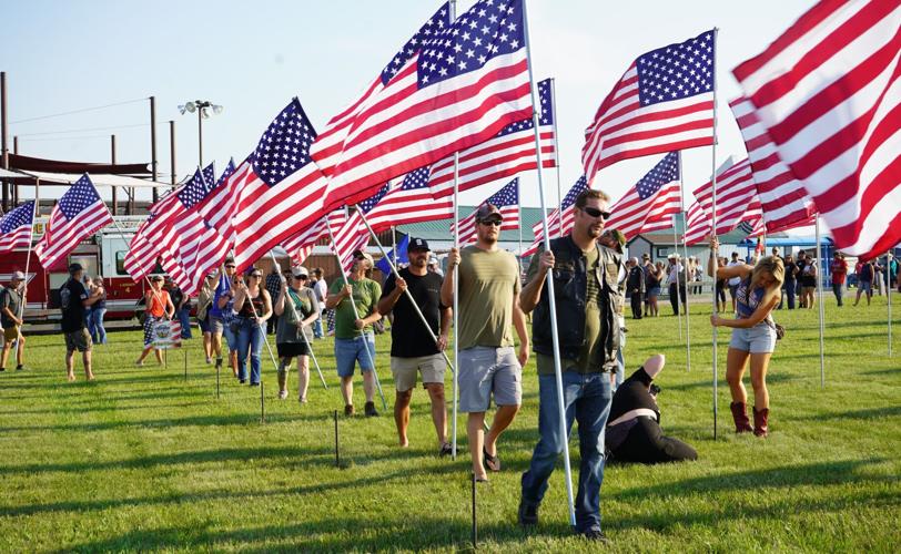 ‘Raising of the Flags’ honors veterans who made the ultimate sacrifice ...