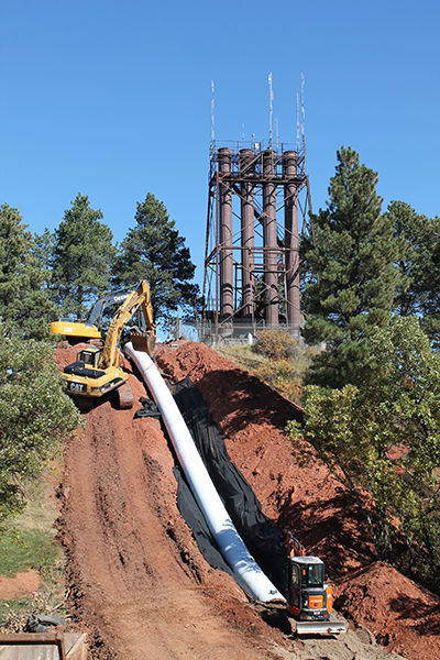 48-inch pipe replacing hydroelectric plant woodstave penstocks to tie ...