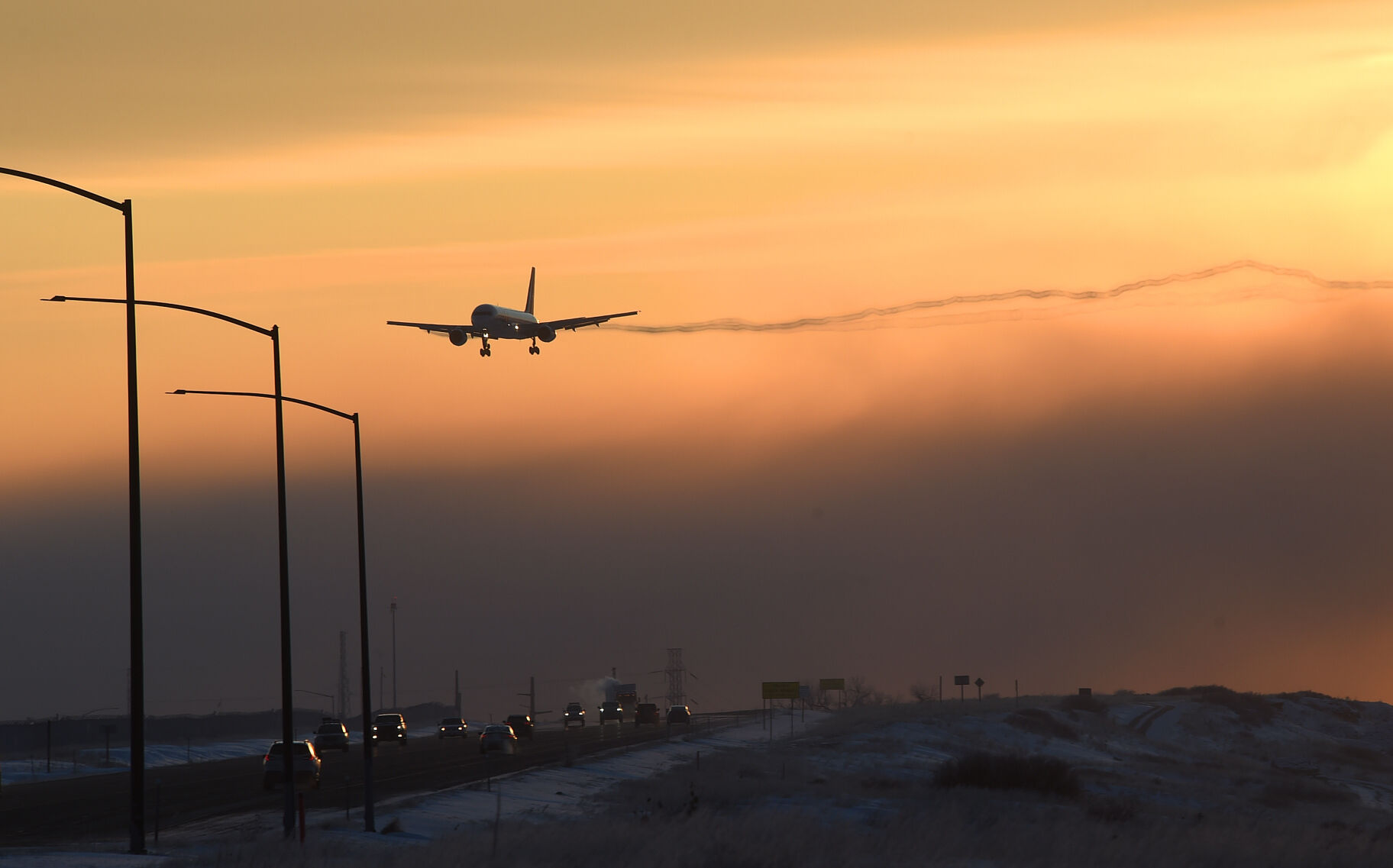 Photo: A wing vortex shows at the record 18 below zero on Friday