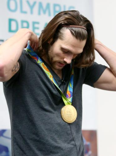 Olympic medalist Cody Miller meets with Billings swimmers