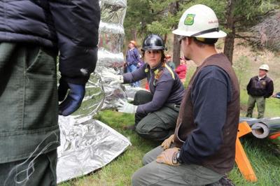 Forest Service shows group how to protect historic buildings from wildfire