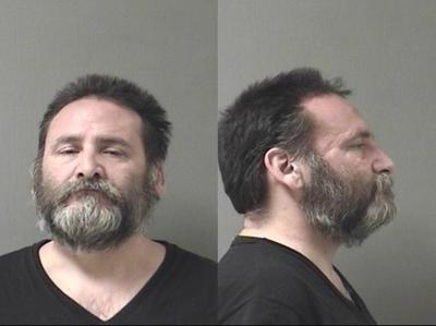 Man accused of threatening neighbor with knife