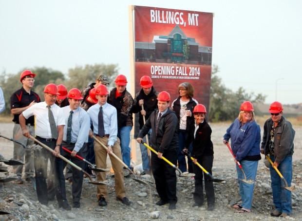 Scheels employees pose for photos