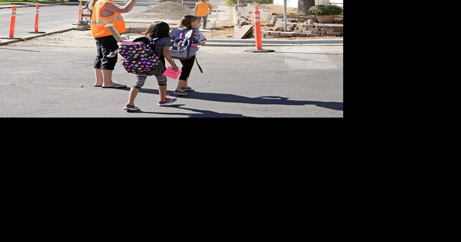 Crossing guards, essential for student safety, in short supply for schools